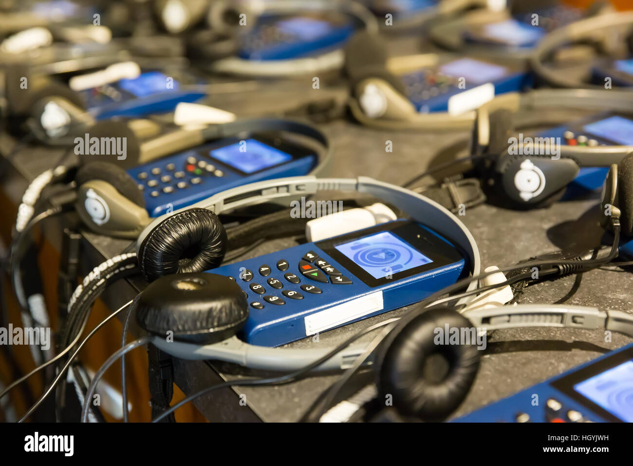 Audio guide with headphones Stock Photo - Alamy