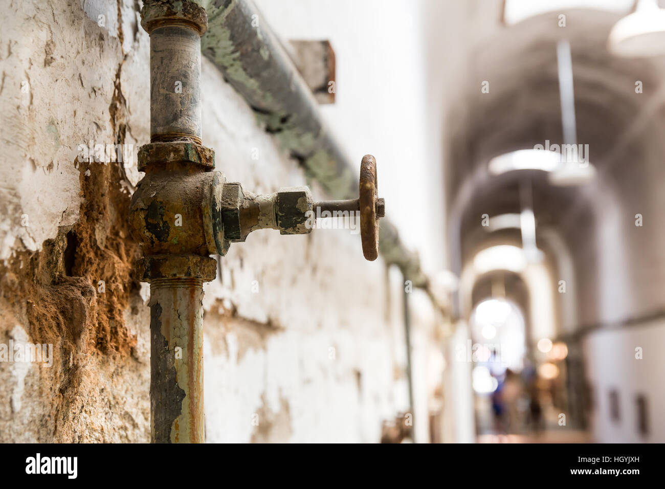 Rusty water pipes of old prison Stock Photo - Alamy