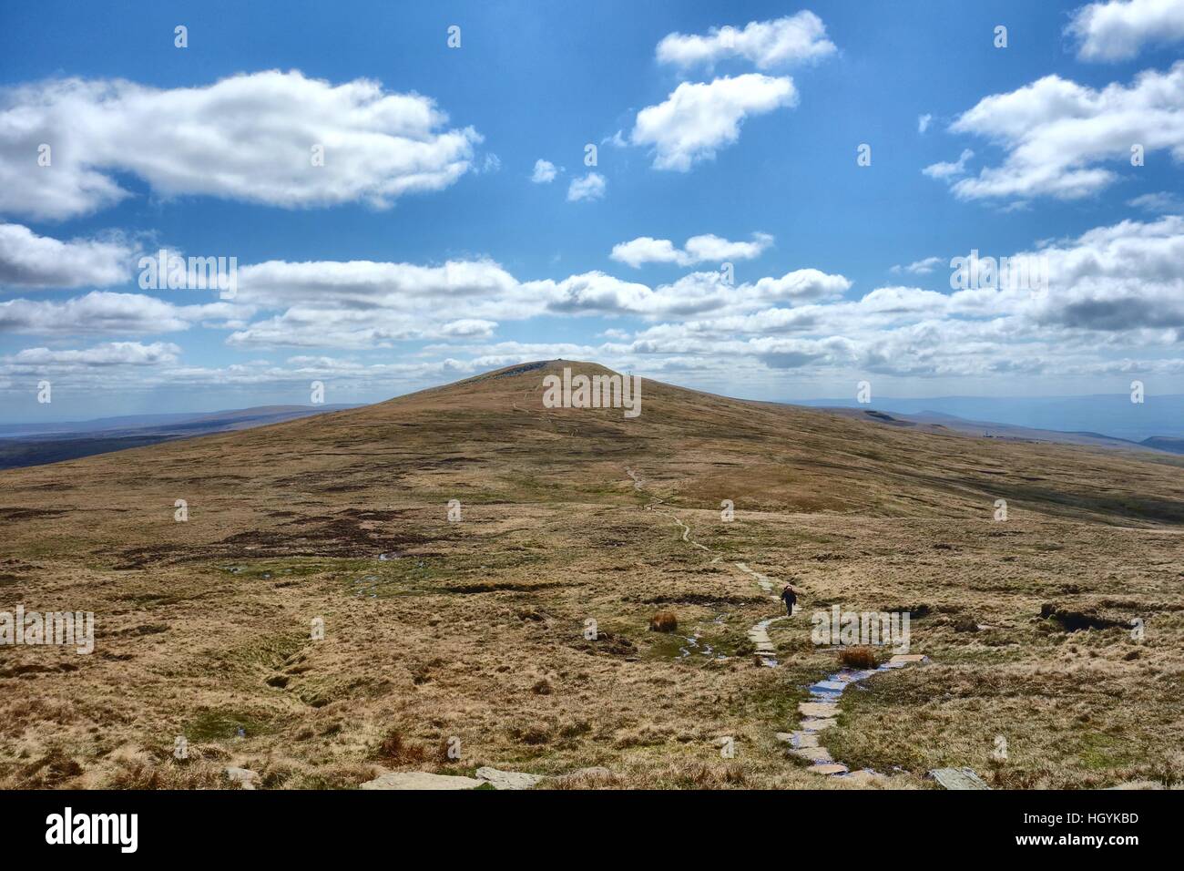 A hiker on the Pennine Way at Little Dun Fell, Cumbria, England Stock ...