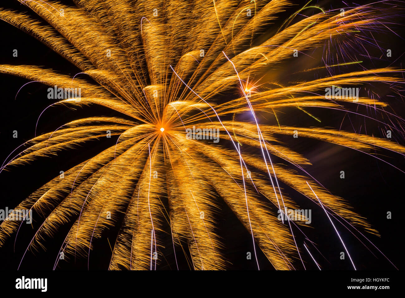 Orange fireworks in night sky, Quebec, Canada Stock Photo - Alamy