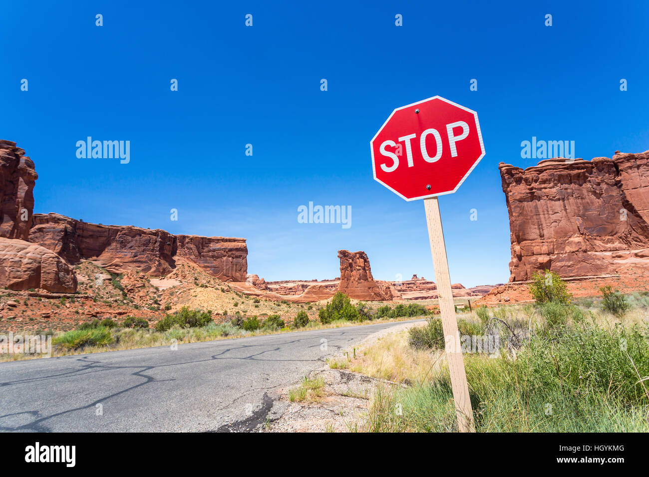 Stop sign on valley road Stock Photo - Alamy