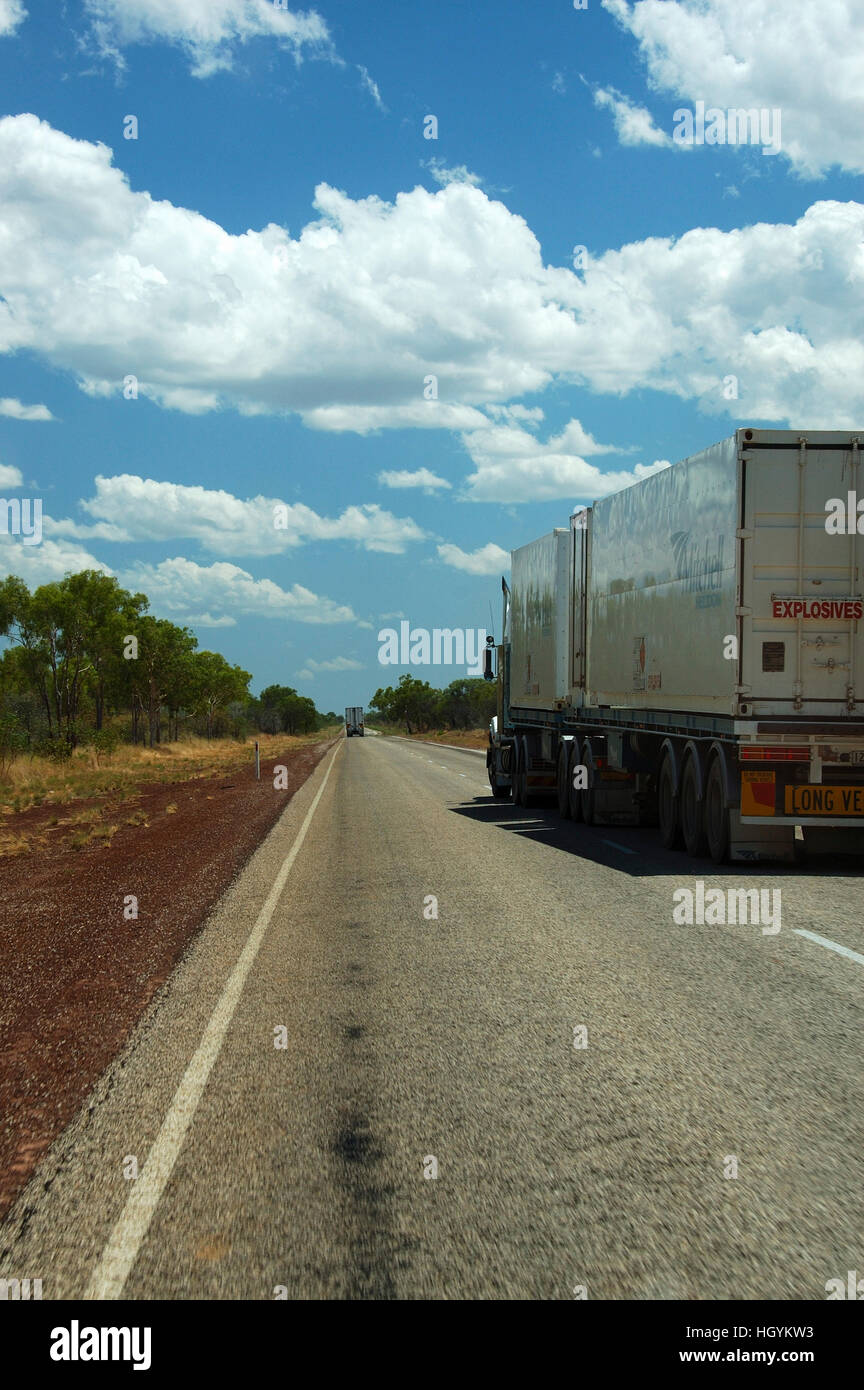 Road train, straight highway in the Australian outback, Northern ...