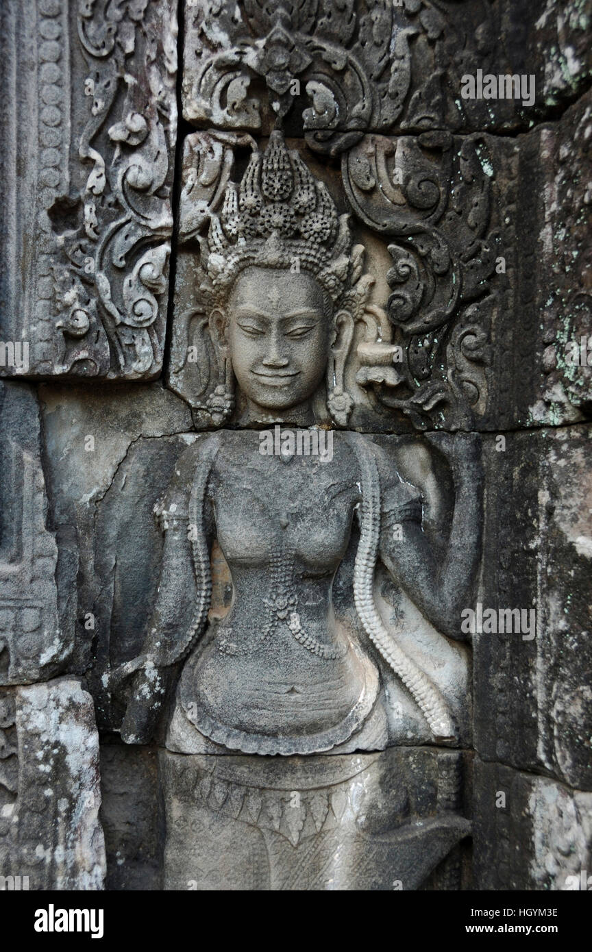 Stone carving of a female face, Apsara, celestial nymphs, Bayon Temple ...