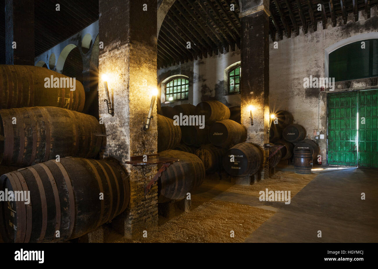 Stacked oak barrels in the wine cellar La Catedral, winery Bodega ...