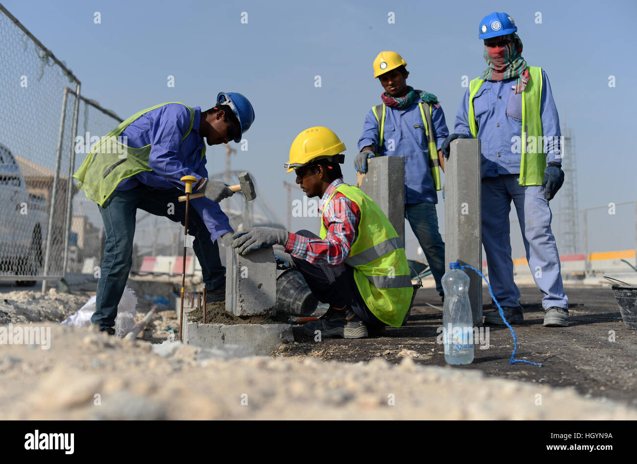 Qatar stadium workers hi-res stock photography and images - Alamy