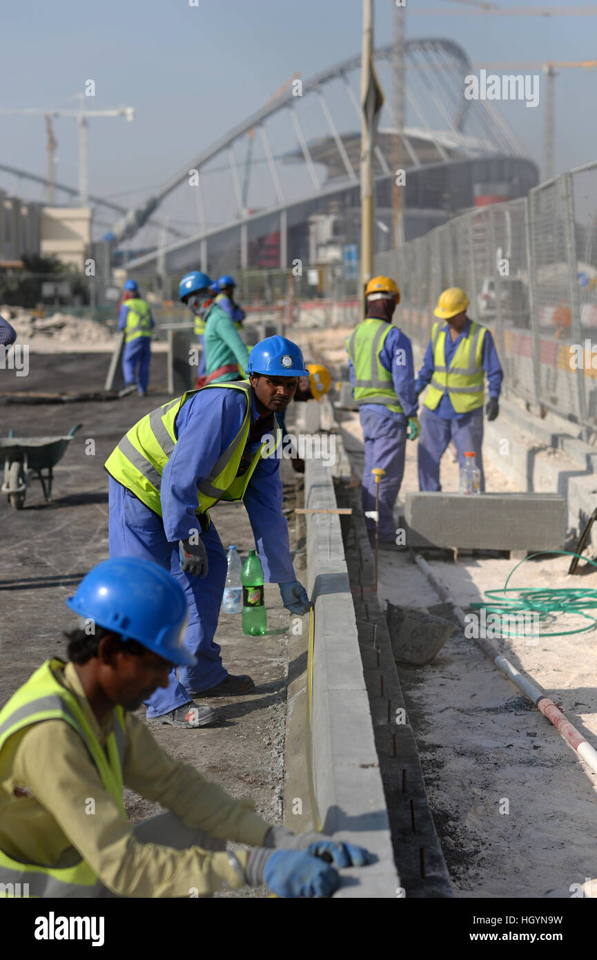 Qatar stadium workers hi-res stock photography and images - Alamy