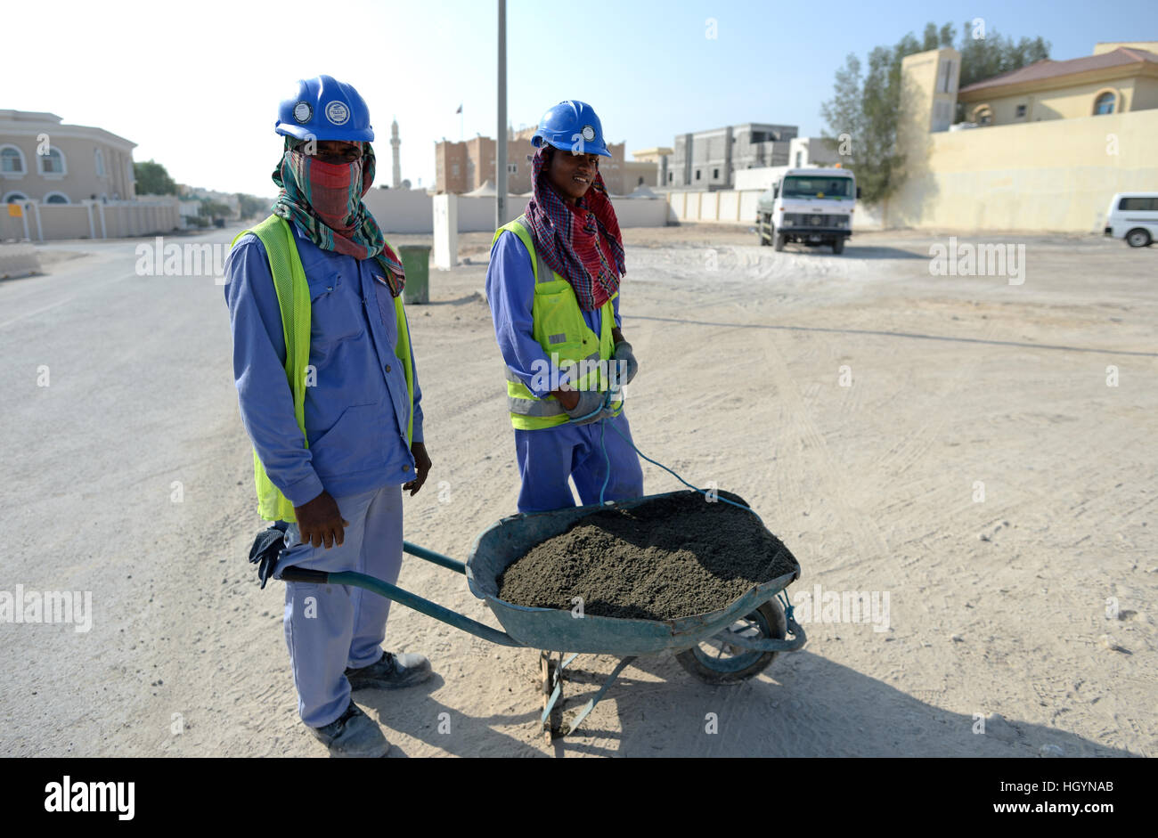 Two Indian workers on a construction site in Doha, Qatar, 11 January ...