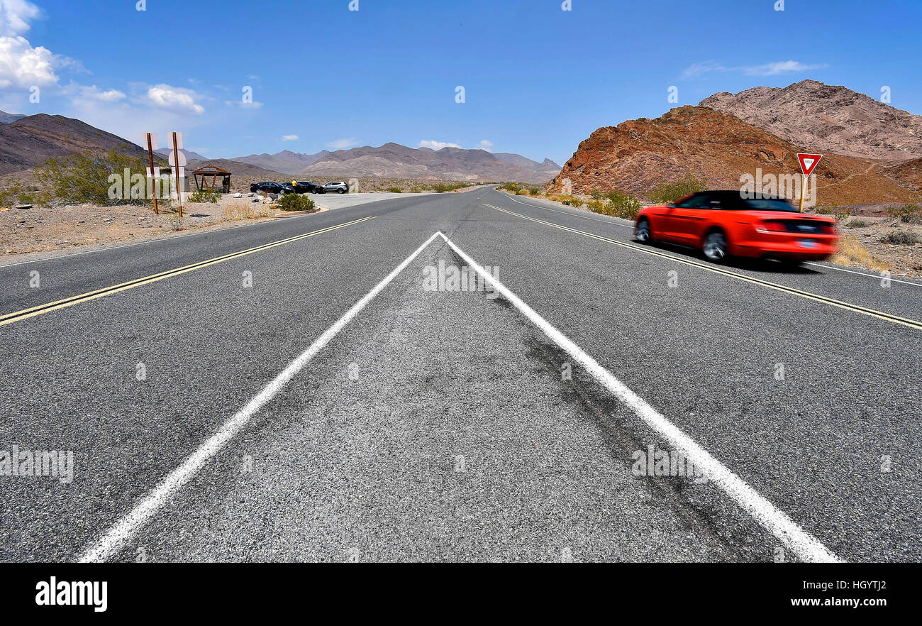 Death Valley National Park, USA. 22nd Aug, 2016. A vehicle travels from ...
