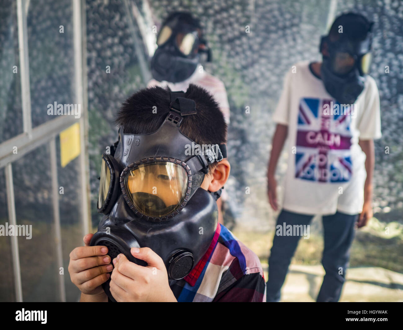 Children wear gas masks hi-res stock photography and images - Alamy