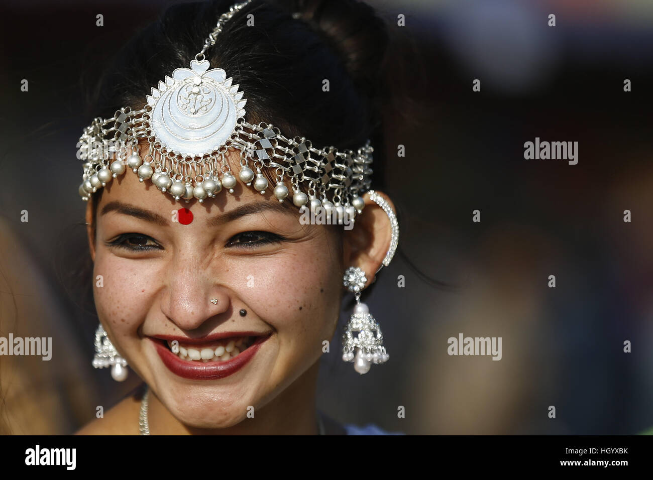 Kathmandu, Nepal. 14th Jan, 2017. A woman from ethnic Tharu community ...