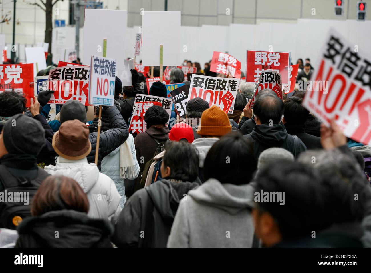 Tokyo, Japan 14th Jan, 2017 Demonstrators hold placards calling for ...