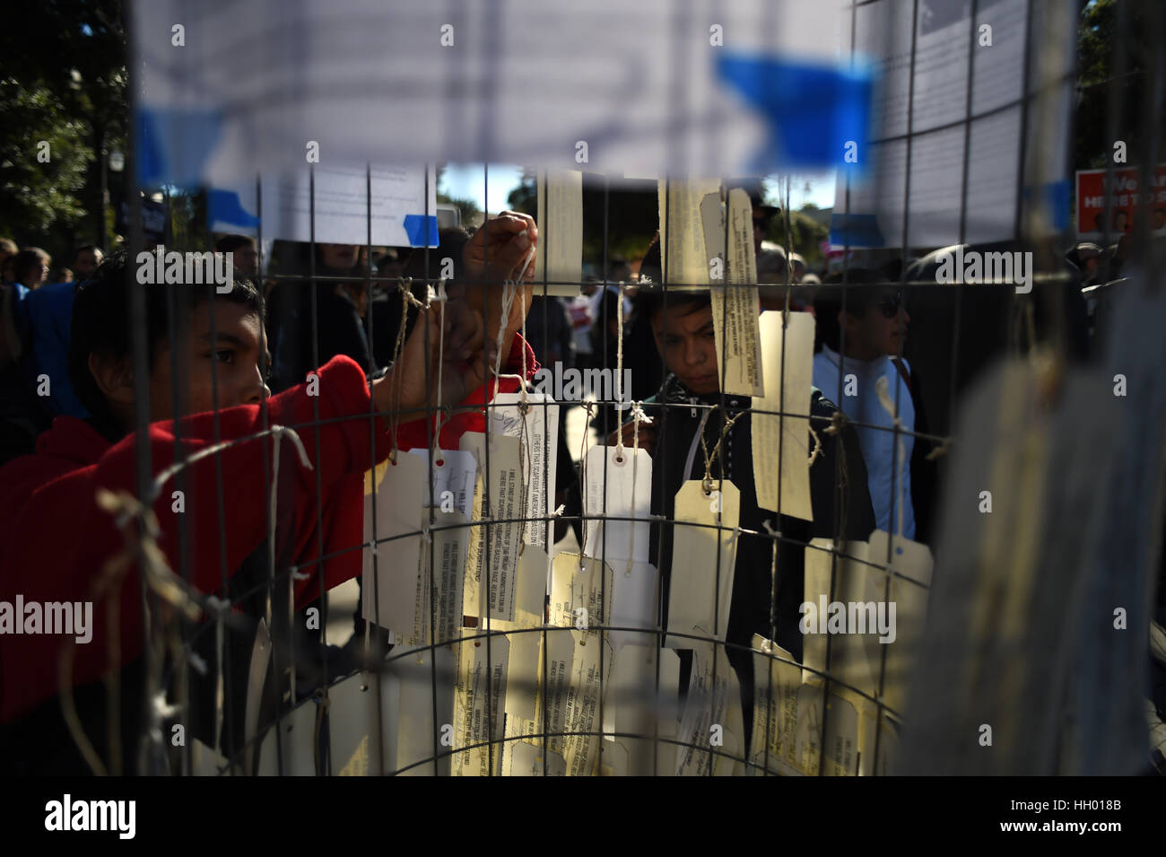 San Jose, USA. 14th January, 2017. Young protestors pin their Unity ...