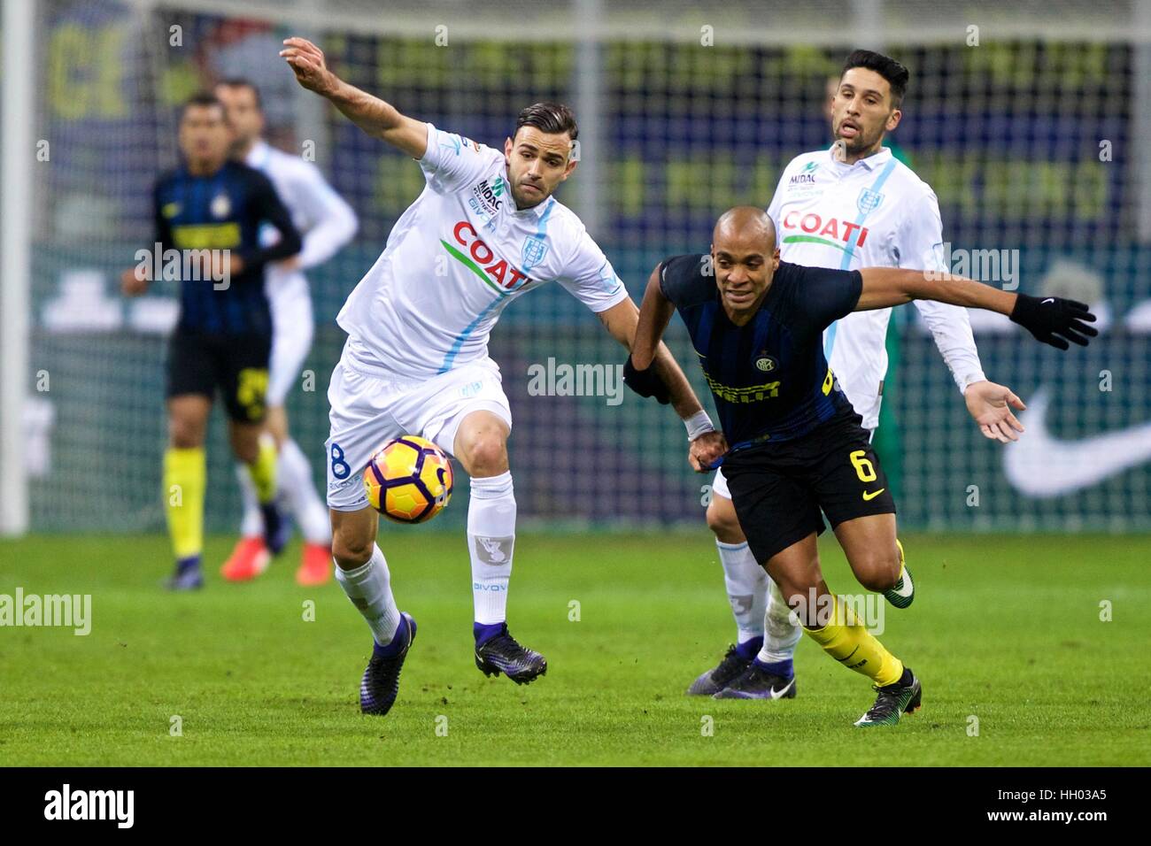 Milan, Italy. 14th Jan, 2017. Chievo's Ivan Radovanovic (L) competes ...