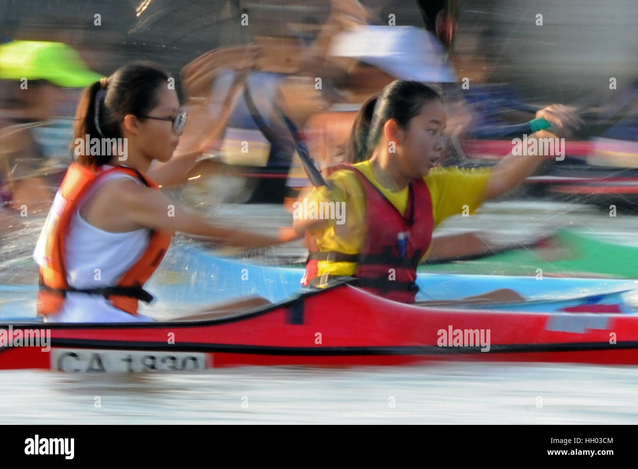Singapore. 15th Jan, 2017. Competitors race in the Singapore Canoe ...