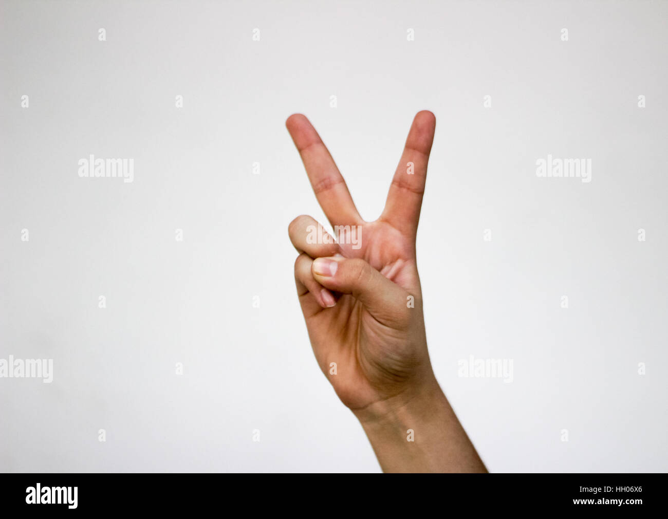 Photograph of a human hand making a symbol Stock Photo - Alamy