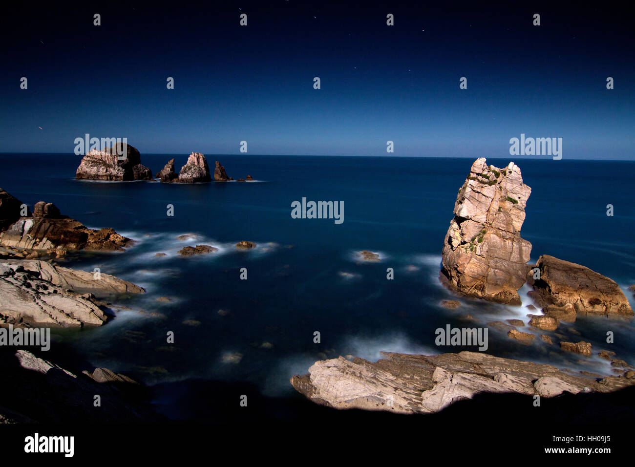 Spain rocky coast at night Stock Photo - Alamy