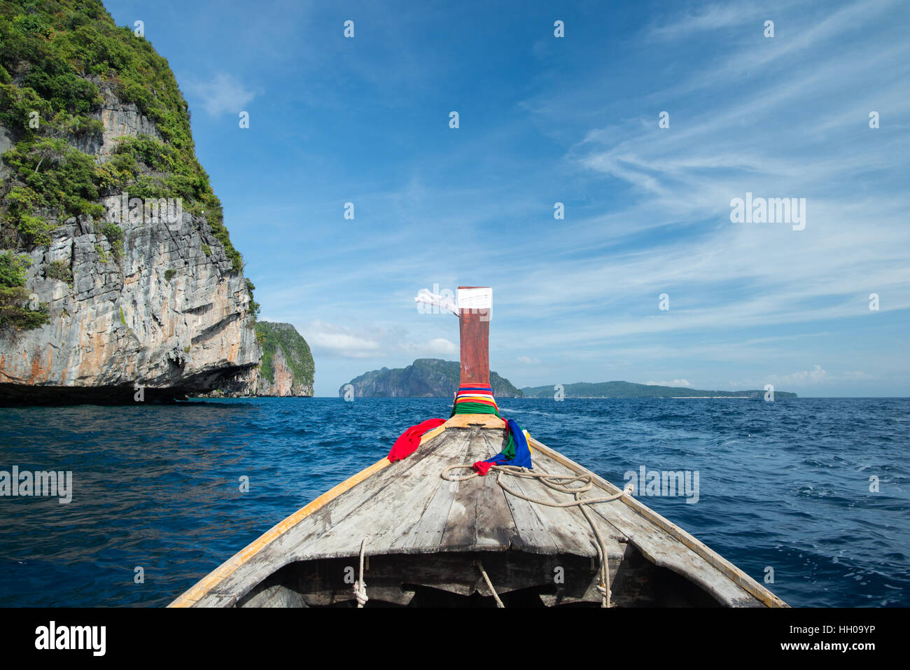Long-tailed boat heading to the sea shore Stock Photo - Alamy