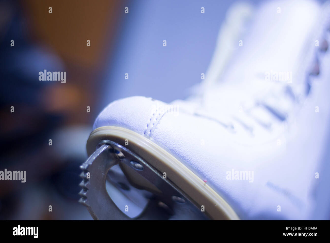 Ice skates in skate store shop window on display on sale for skating on ...