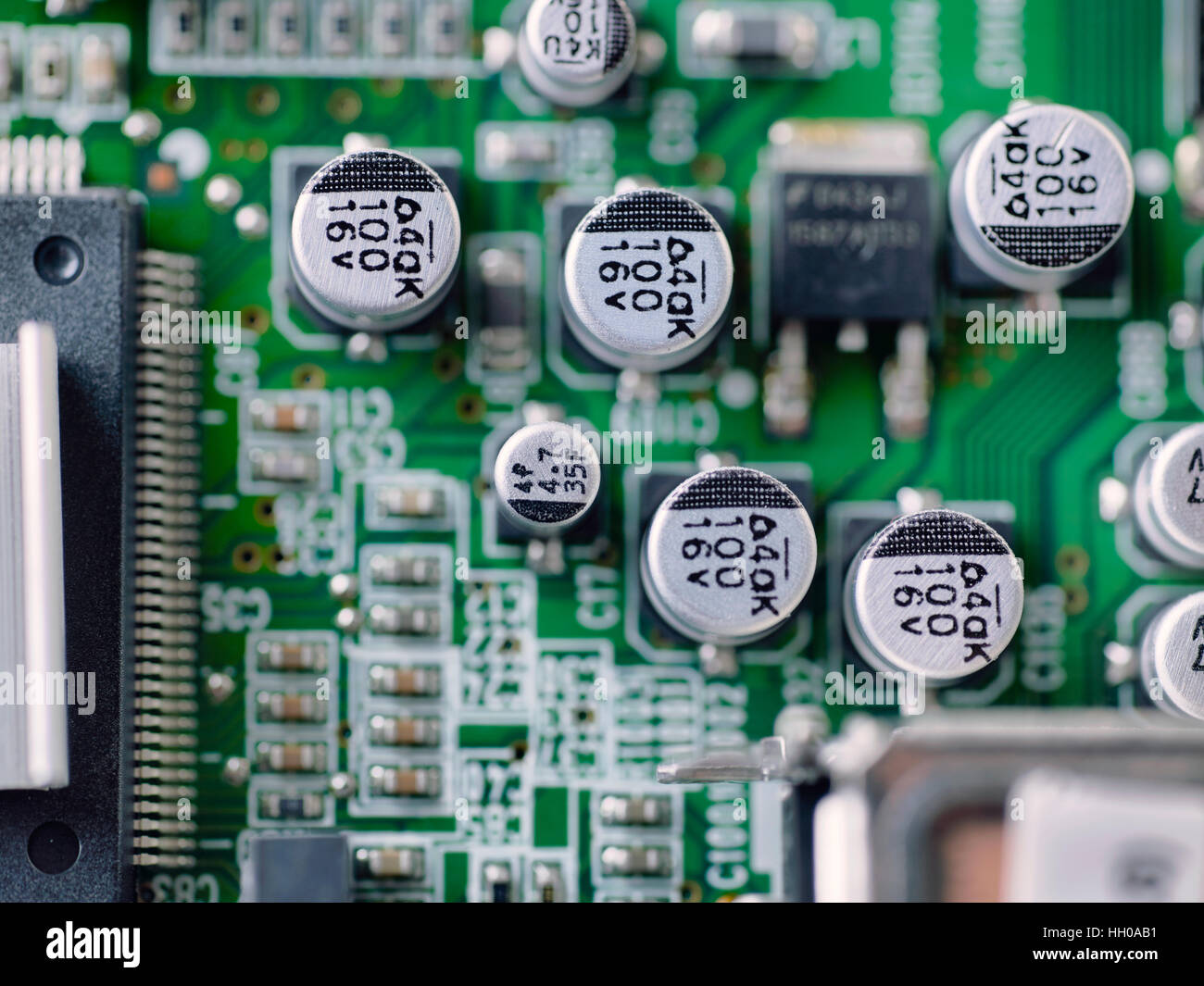 Top view of electronic microcircuit with microchips and capacitors ...