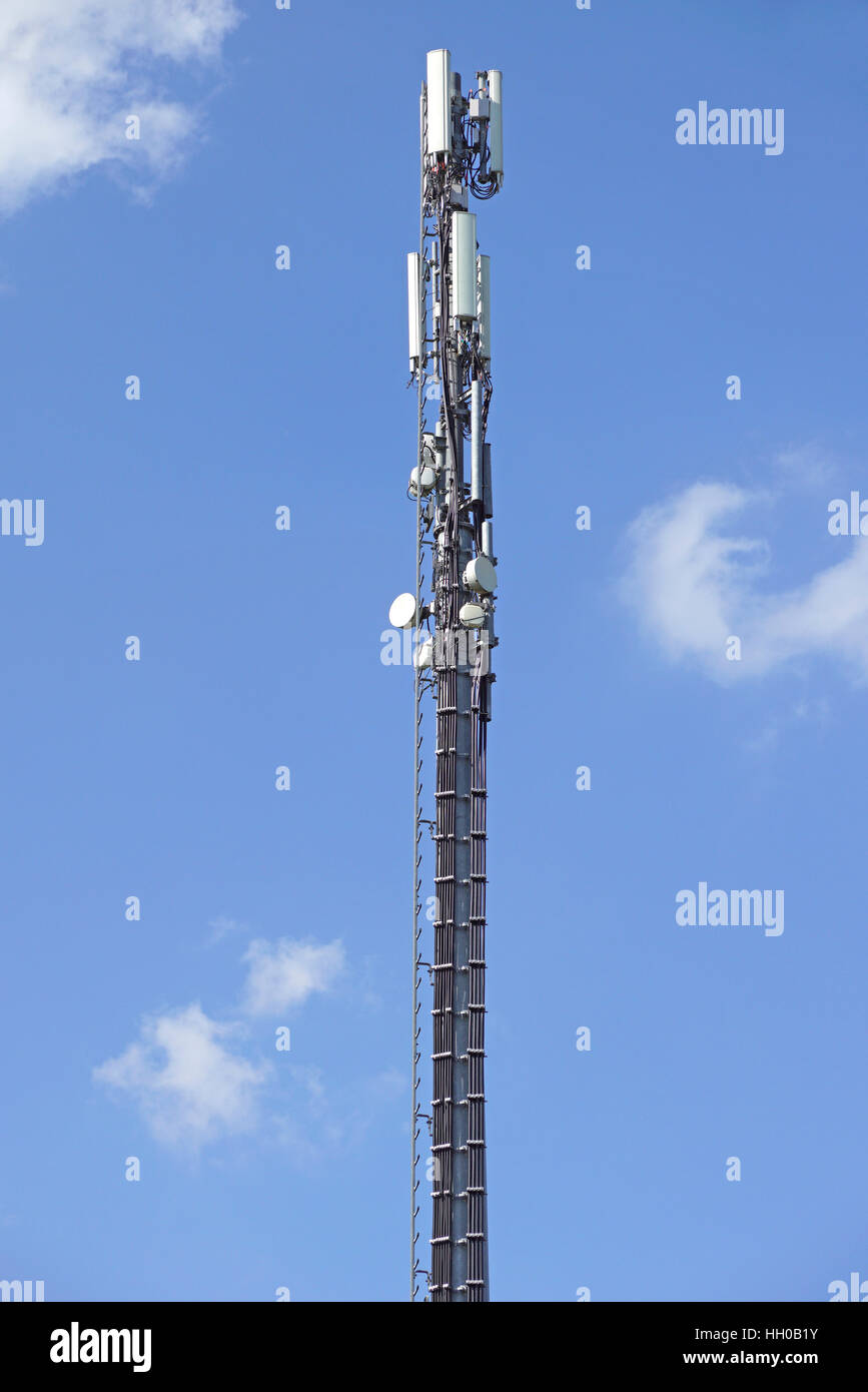 structure tower of cell phone antenna with blue sky Stock Photo - Alamy