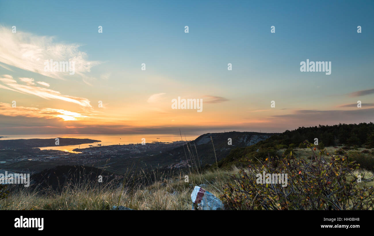 Sunset in the bay of Trieste from Val Rosandra Stock Photo - Alamy