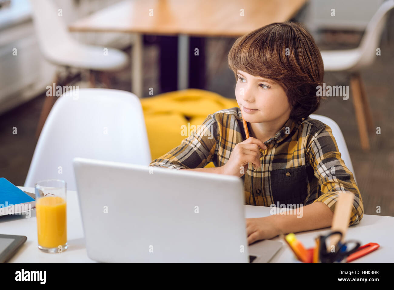 Little boy looking at distance Stock Photo - Alamy