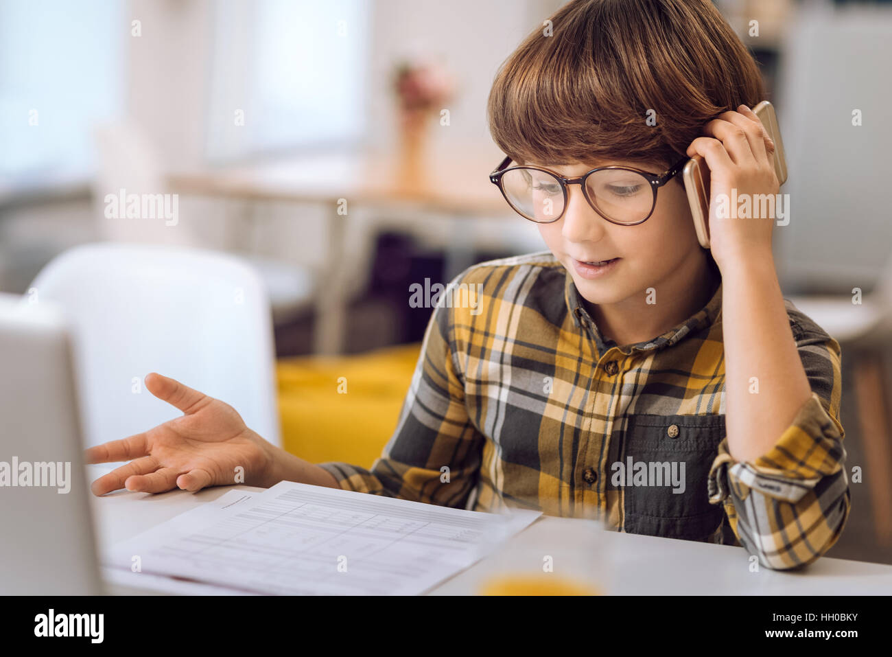 Little man-child speaking on phone Stock Photo - Alamy