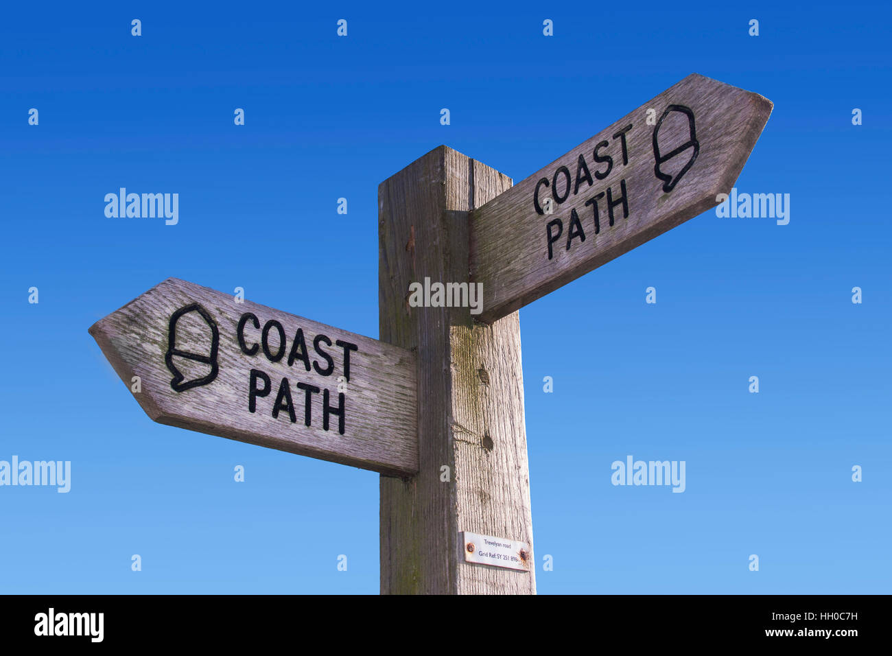 Wooden coast path sign, on the seafront at Seaton, Devon Stock Photo ...
