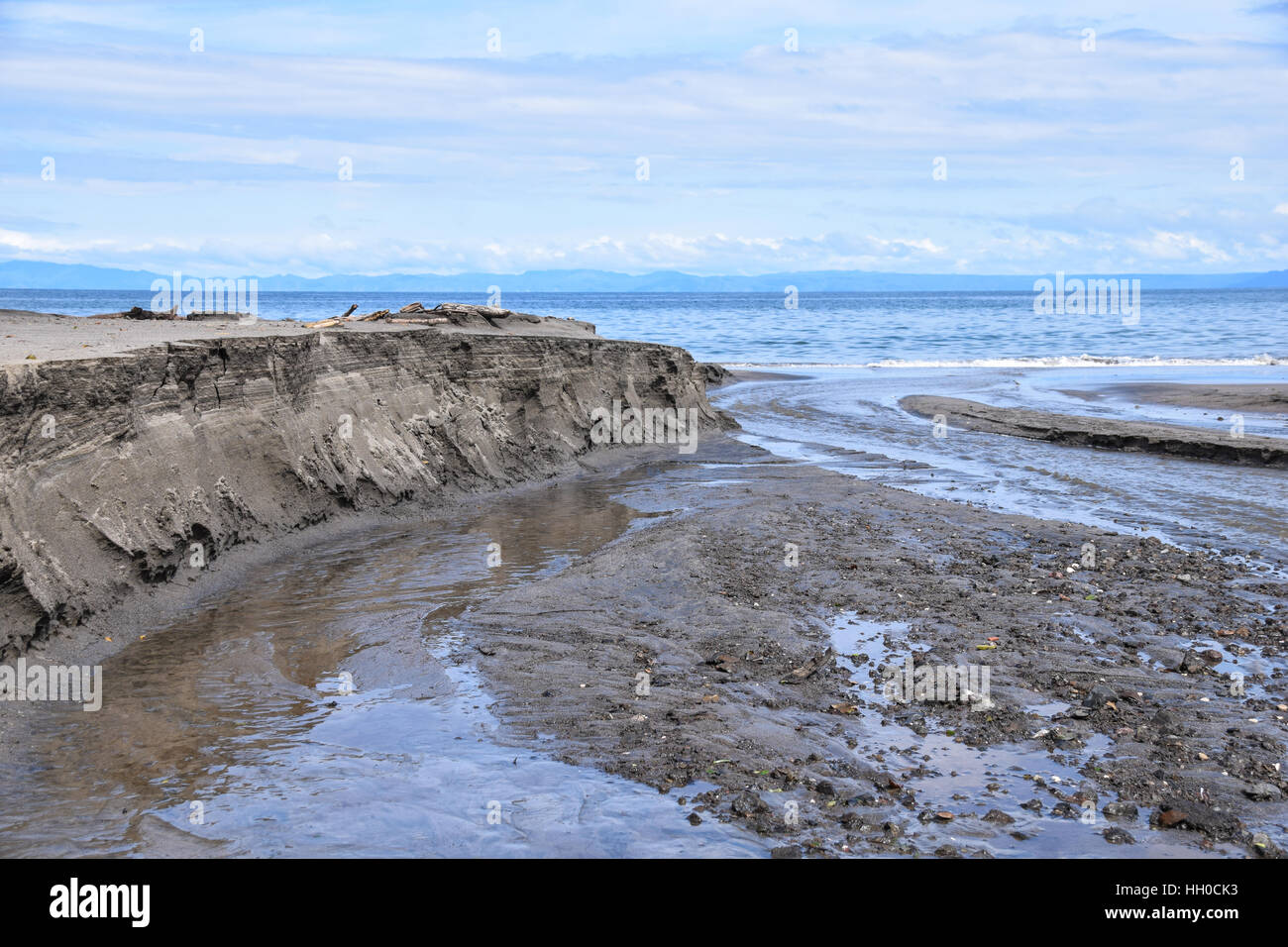 Coastal sand washed away by over flowing rivers following Hurricane ...