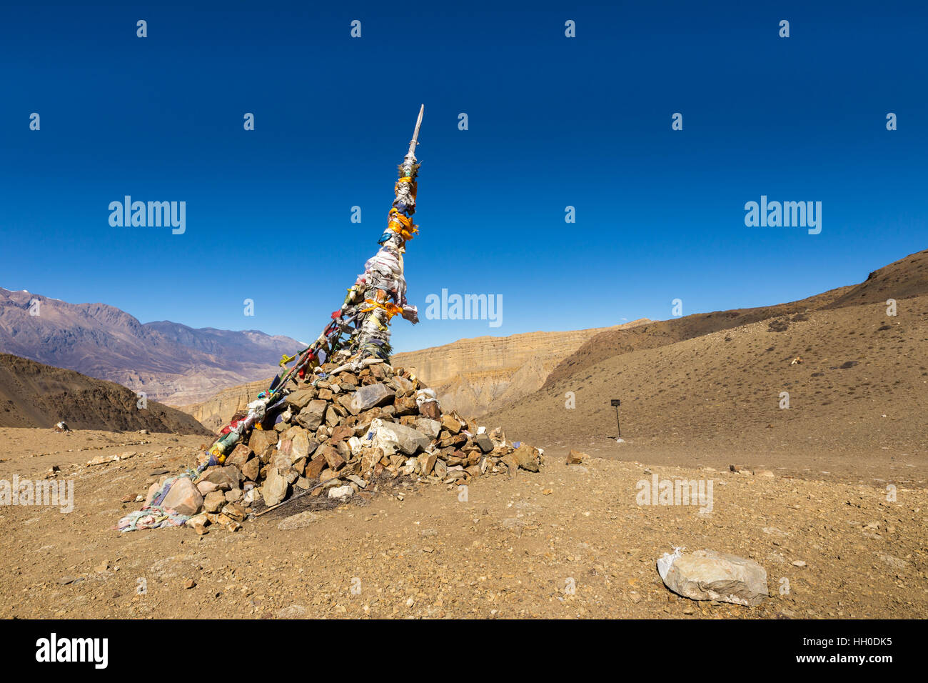 Traditional Tibetan pile and colored flags on the pass, Himalayas ...