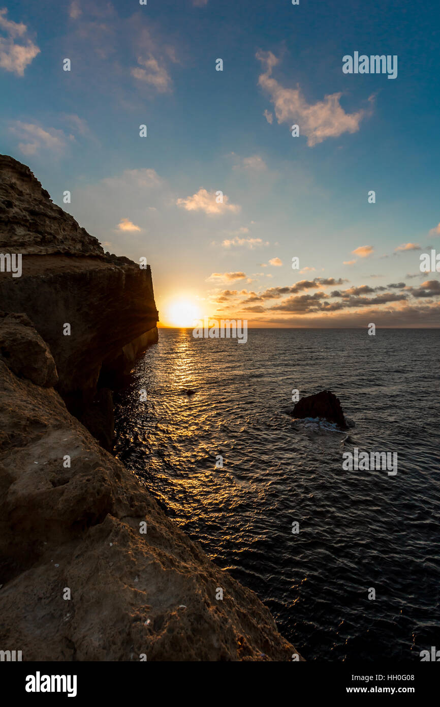 Ocean sunset on Mediterranean sea from Ras lma, rocks coast where ...