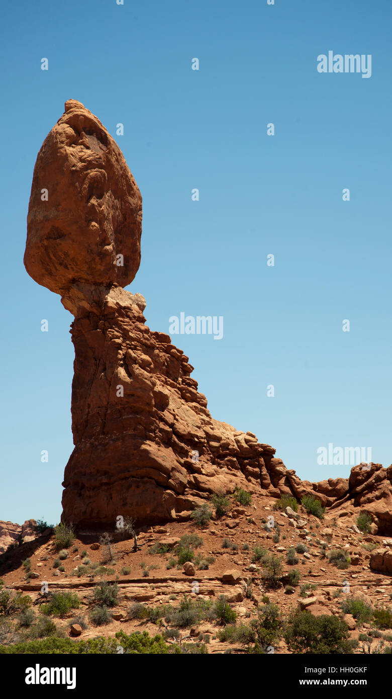 Balanced rock closeup, the red sandstone hold the rock in an impossible ...