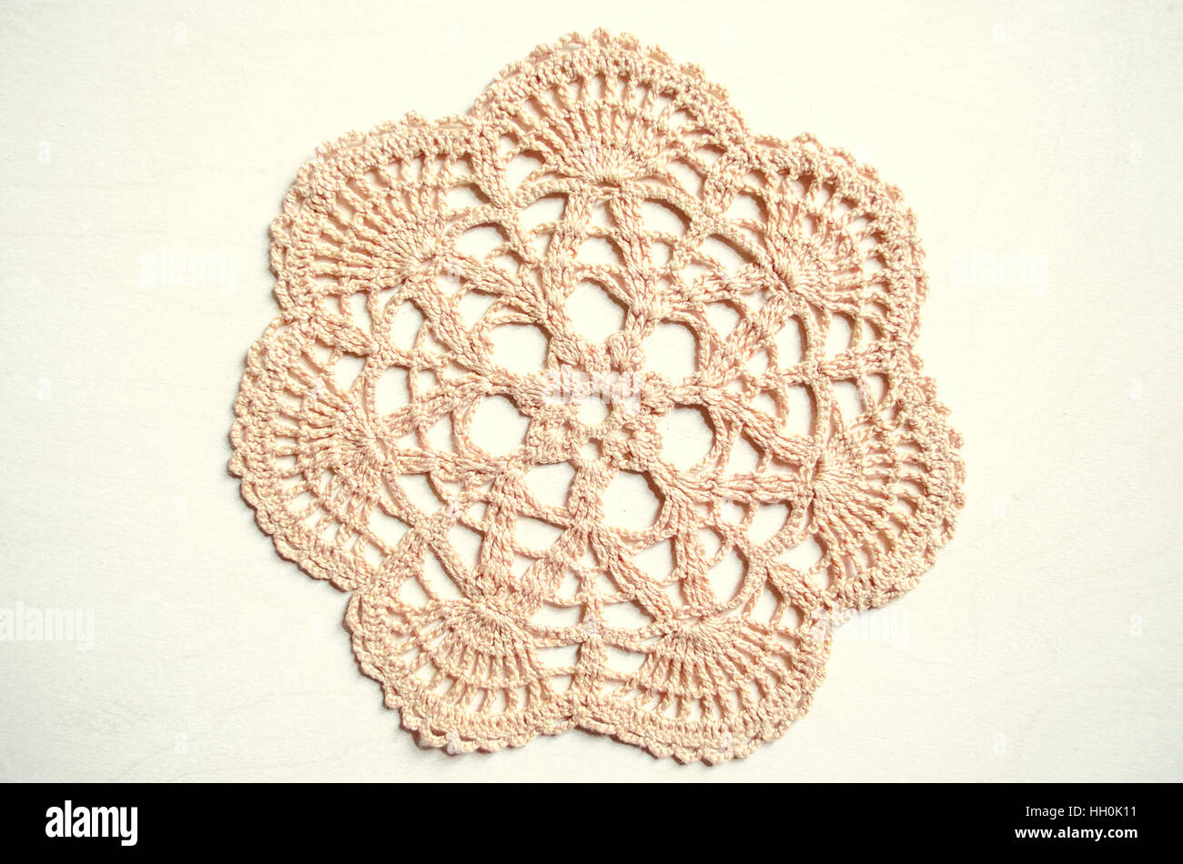 Napkin cream colored, related crochet of coarse cotton yarn Stock Photo ...