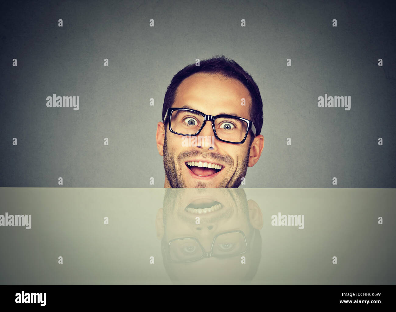 Hiding under table hi-res stock photography and images - Alamy