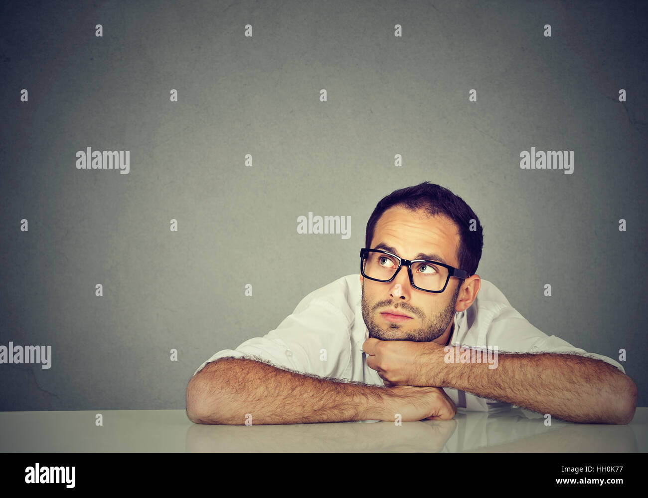 Thinking business man Stock Photo - Alamy