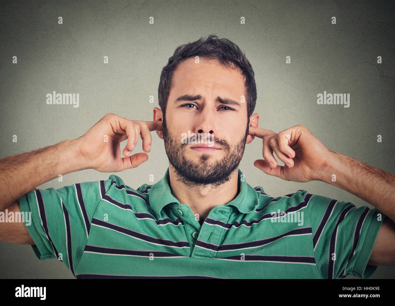 Plugging ears hi-res stock photography and images - Alamy