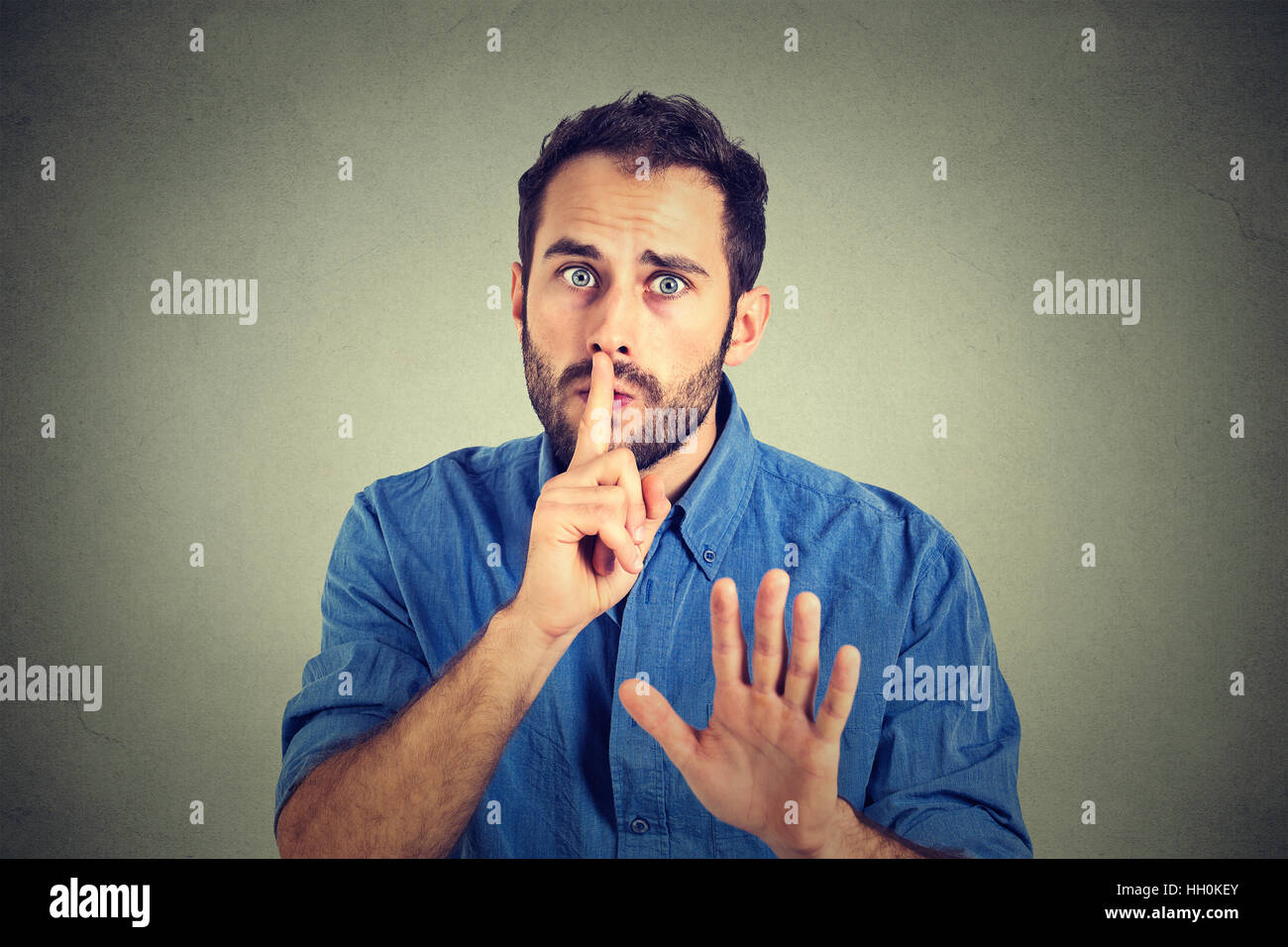 Gesture for silence hi-res stock photography and images - Alamy