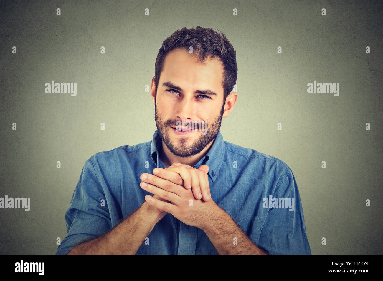 Sneaky scheming young man, worker trying to plot something, screw ...