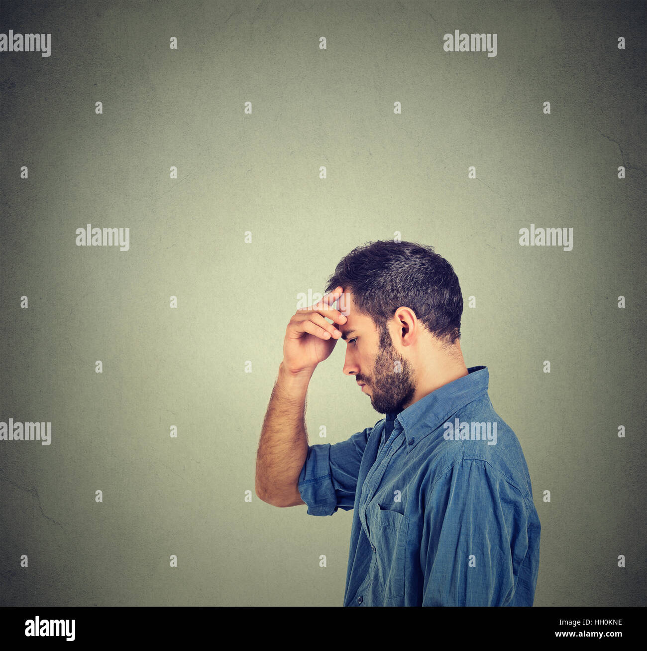 Side Profile Young Thoughtful Man Isolated On Gray Wall Background With