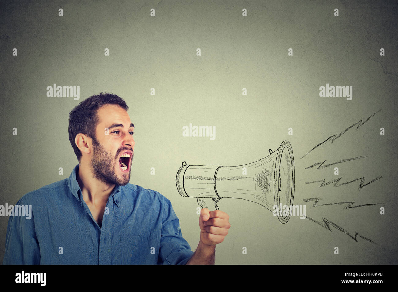 Side profile young man screaming hi-res stock photography and images ...