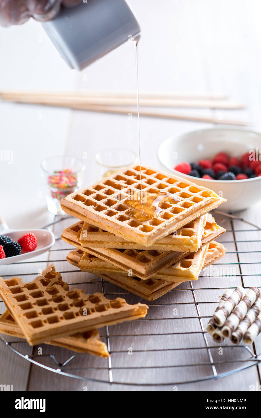 delicious waffle with honey Stock Photo - Alamy