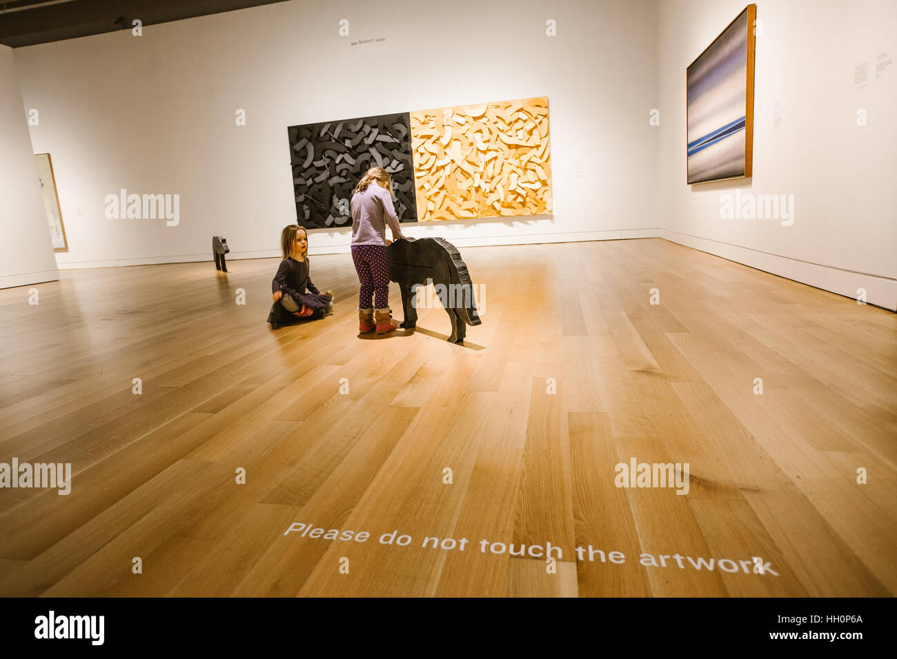 children kids touching artwork inside art gallery Stock Photo - Alamy
