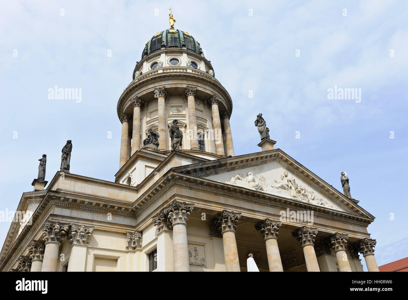 The facade of the Neue Kirche Cathedral with a dome in Gendarmenmarkt ...