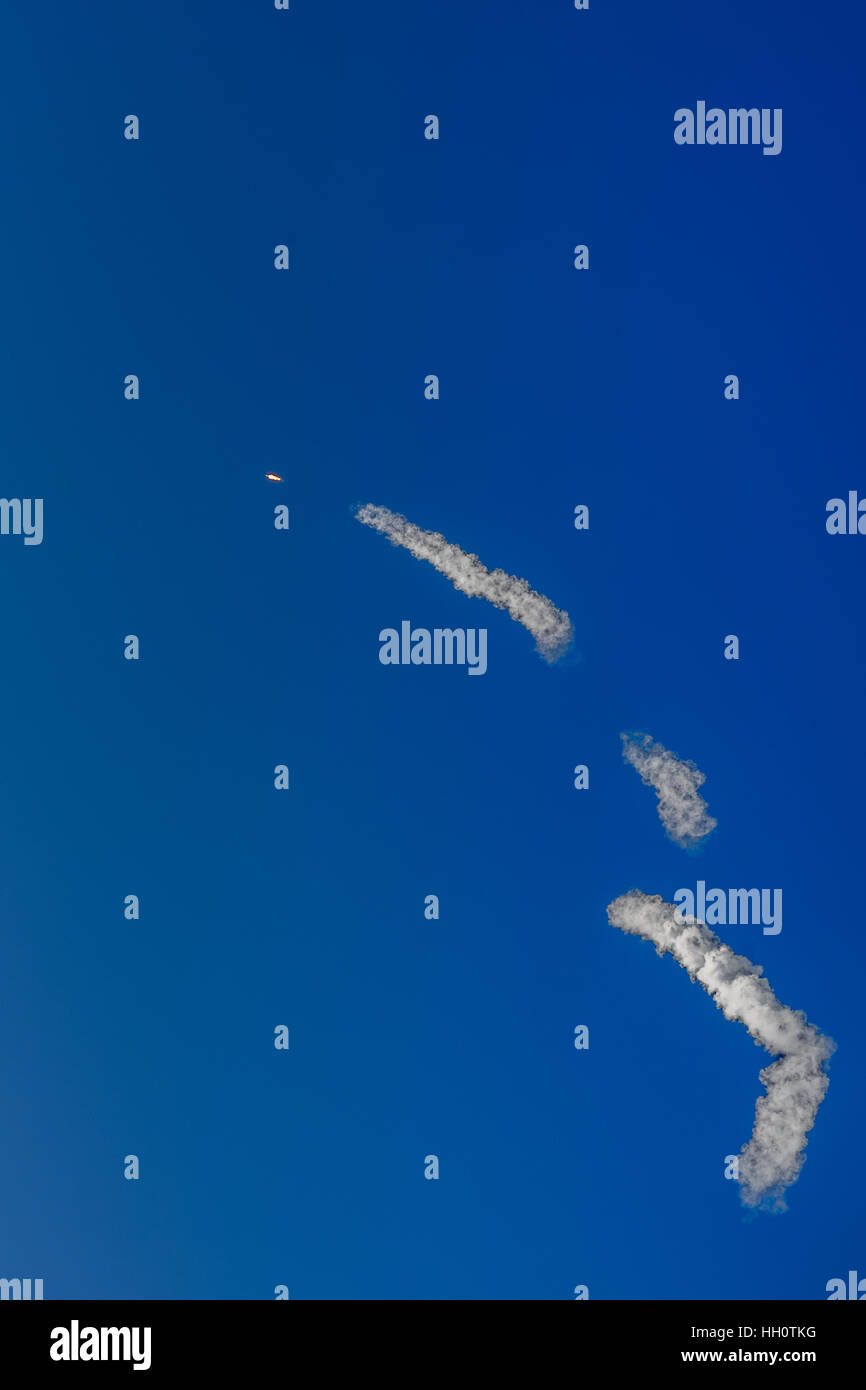 SpaceX Falcon 9 rocket in flight with smoke patches Stock Photo - Alamy