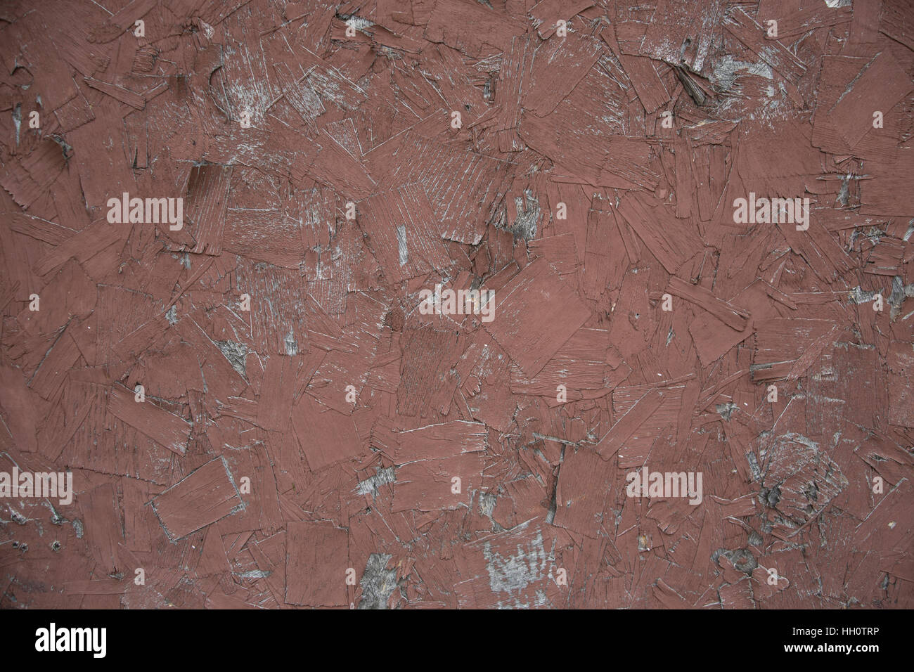 Painted wafer board (OSB) fading and chipping in the weather Stock ...