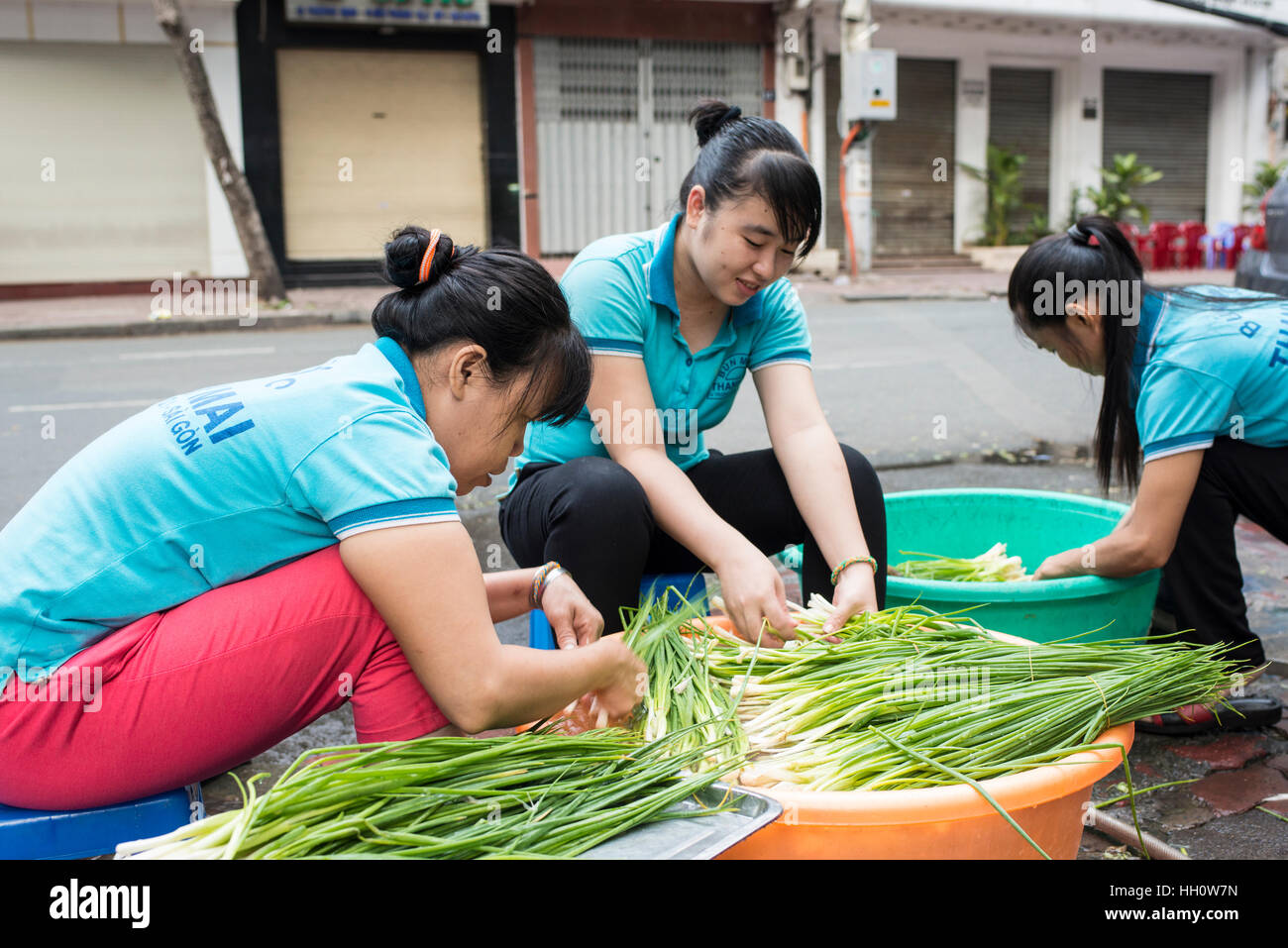 Vietnamese women preparing vegetable, Saigon, Vietnam Stock Photo - Alamy