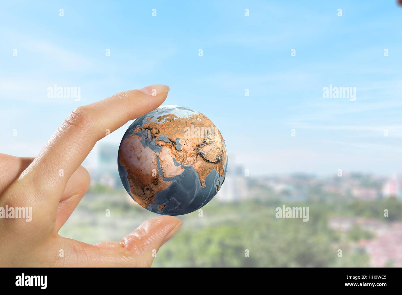 Female hand holding Earth planet presenting connection technologies ...