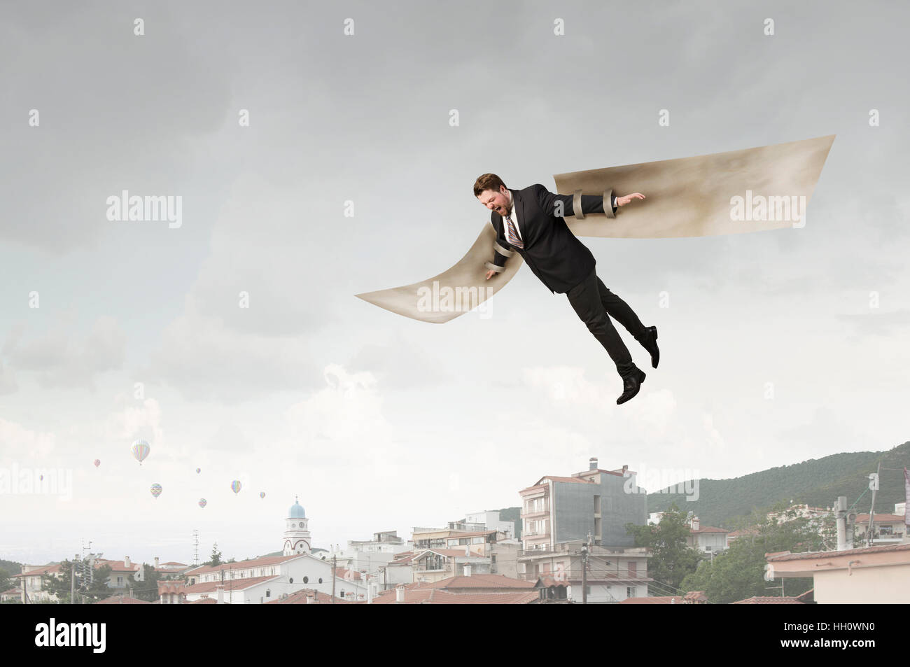 Businessman flying with wings hi-res stock photography and images - Alamy