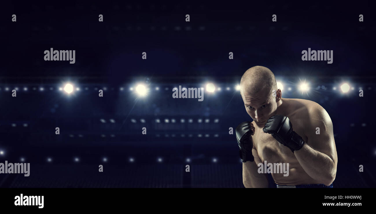 Professional box fighter on grand arena. Mixed media Stock Photo - Alamy