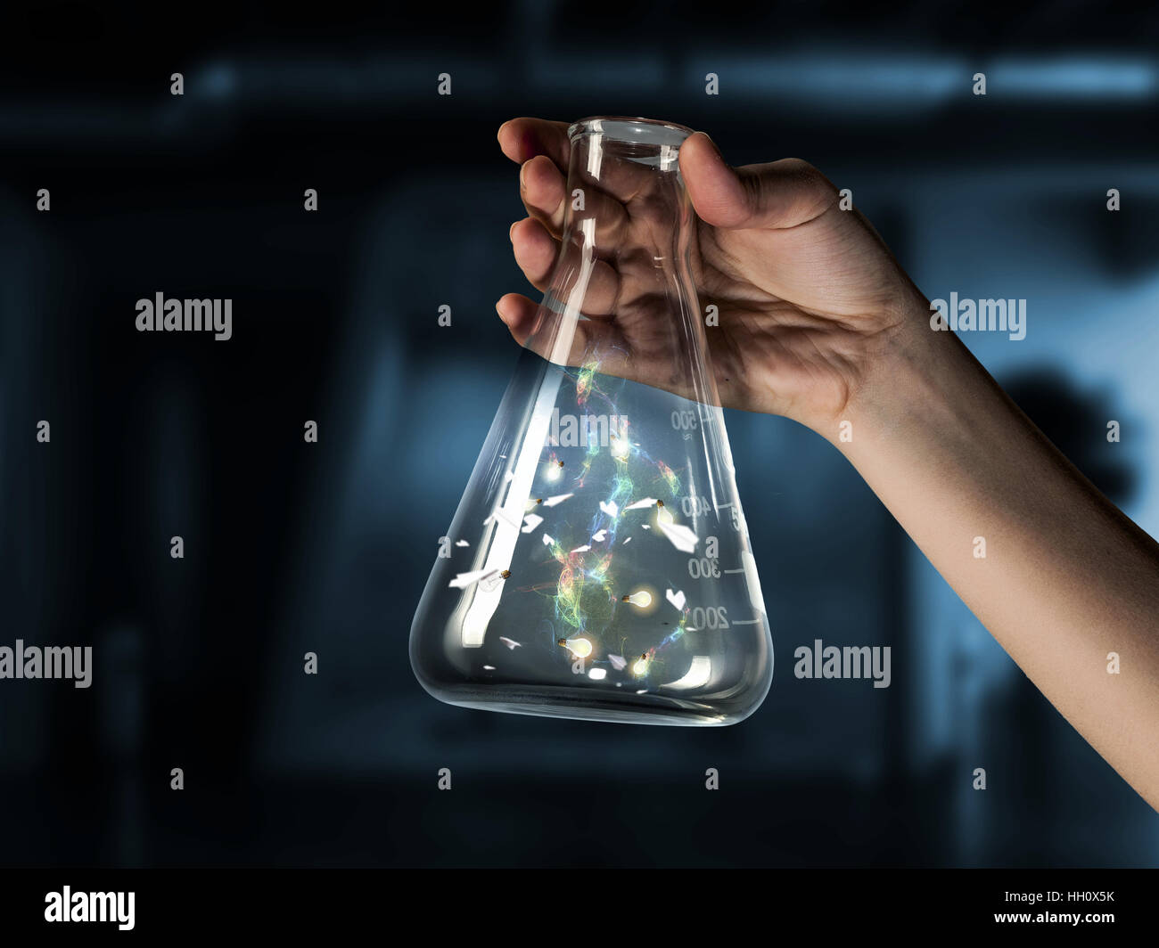Hand holds flask glass hi-res stock photography and images - Alamy